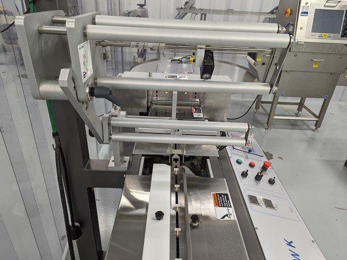 Used PFM Hawk Horizontal Flow Wrapper for Sale at Steep Hill Equipment ...