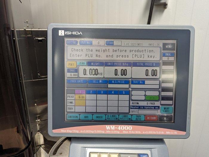 Used Ishida WM-4000 Auto Tray Wrapper for Sale at Steep Hill Equipment ...