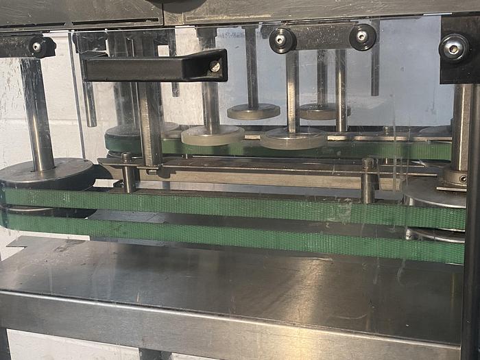 Used Sold Flo-Cap Packaging Systems Cap Tightener at GlobePack Equipment